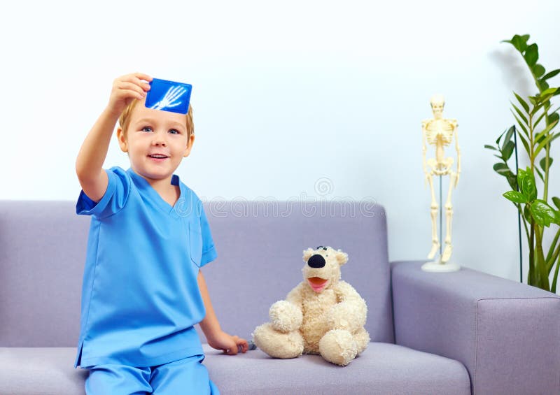 Cute Young Kid Playing a Doctor in Office Stock Image - Image of bone ...