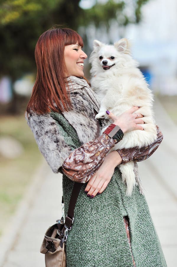 Cute Young Lady Holding a Puppy Dog Stock Photo - Image of life ...