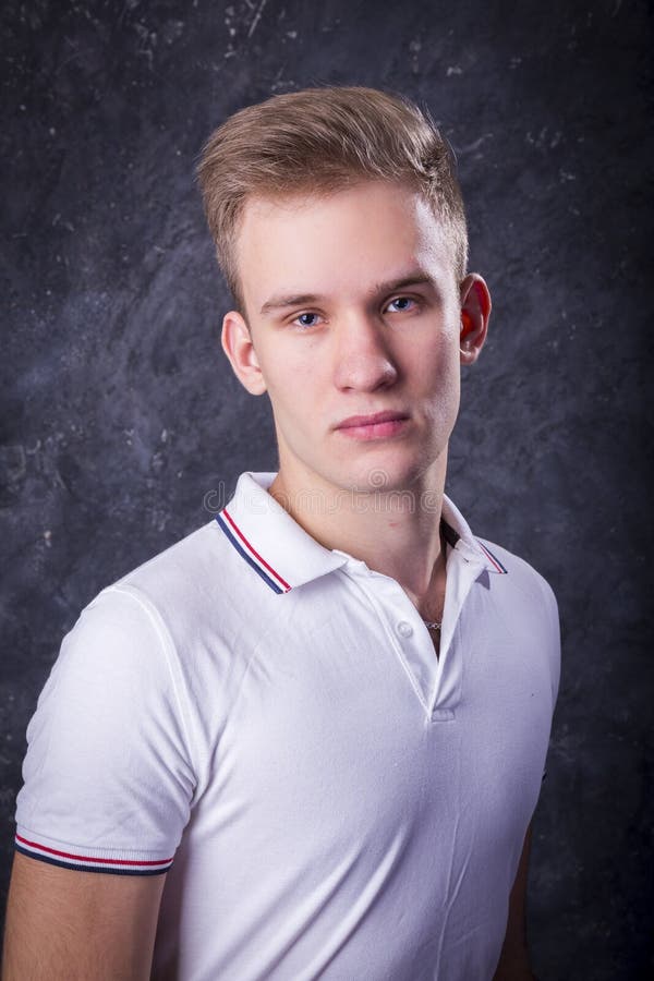 Cute Young Man Dressed in Casual Studio Portrait. Stock Photo - Image ...