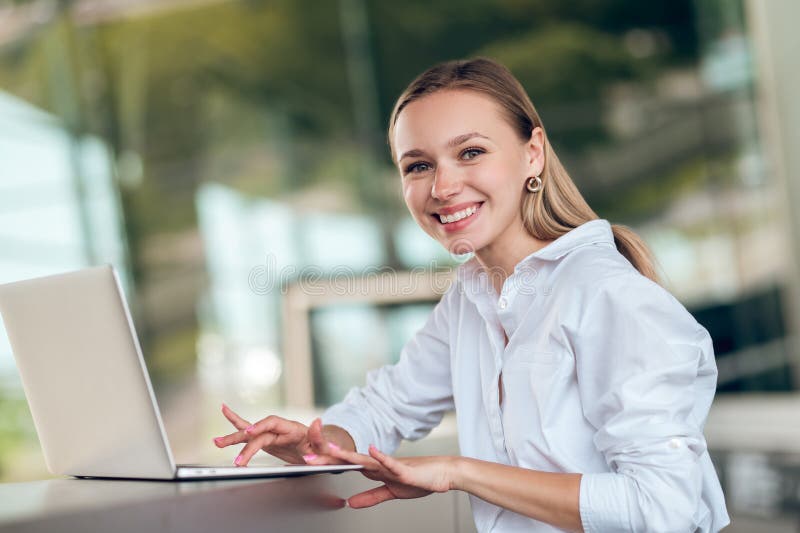 Cute Young Manager Working on a Laptop Stock Image - Image of ...