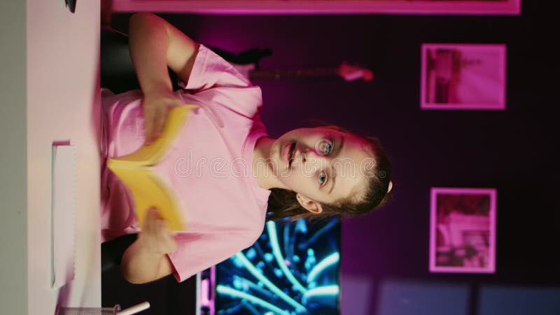 Cute Young Media Star Assessing Book Received As Homework from School ...