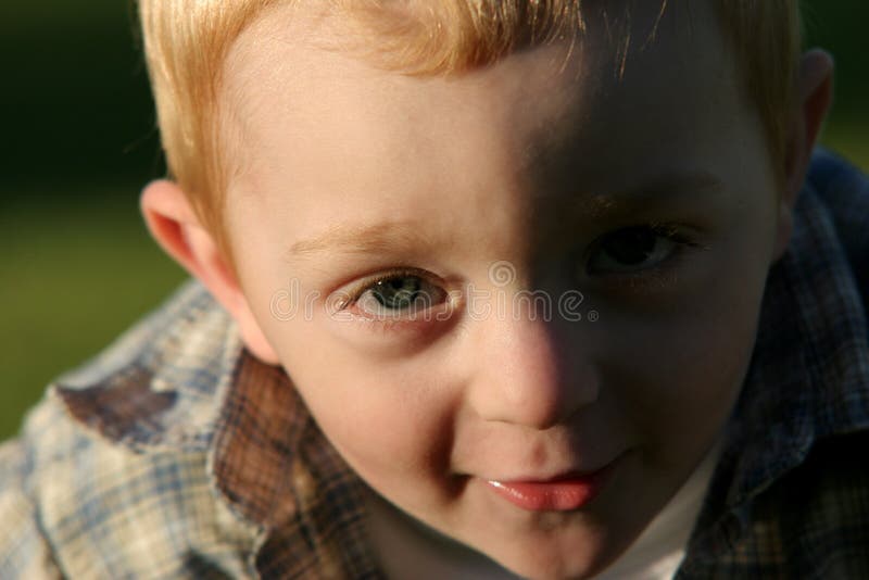 Cute young redheaded child stock photo. Image of smile - 302196
