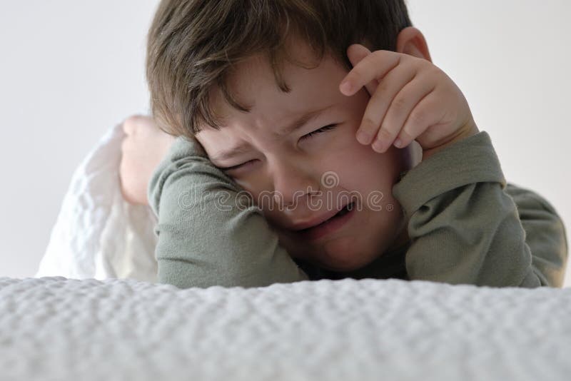Cute Young Boy Crying Near the Bed Stock Photo - Image of size, family ...