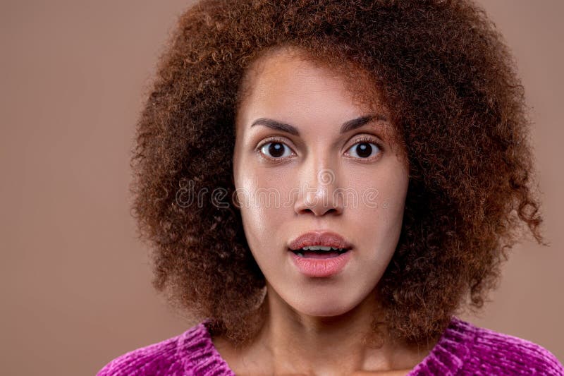 Cute Young Woman Looking Astonished and Confused Stock Photo - Image of ...