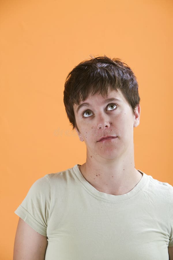 Cute Young Woman Looking Up Stock Photo - Image of look, shirt: 16750202