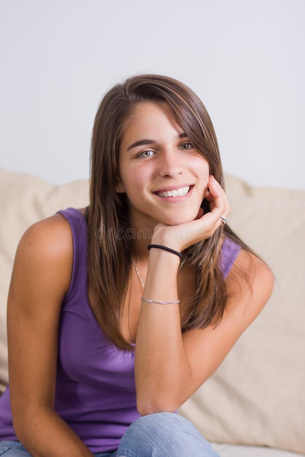 Cute Young Woman Posing on a Couch Stock Image - Image of people, adult ...