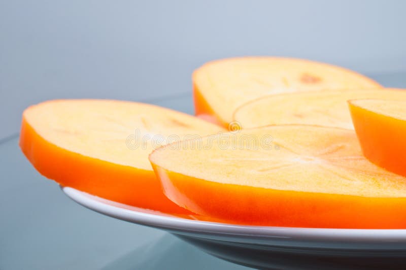 Cuted Persimmon Few Pieces on Plate Stock Photo - Image of nature ...