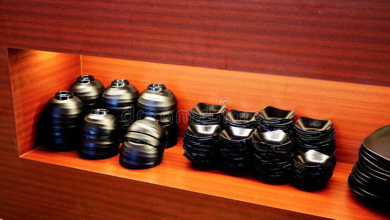 Cutlery, Bowls, Plates Neatly Arranged in the Restaurant Cupboard Stock ...