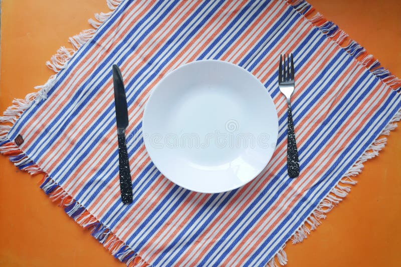 Cutlery and Empty Plate on Color Background Top Down Stock Image ...