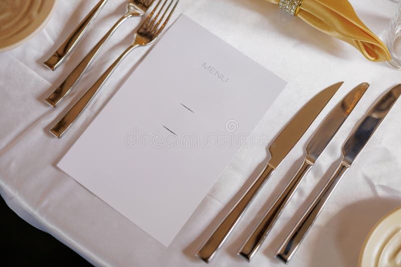 Cutlery and Menu on a Table in a Restaurant Close-up Stock Image ...