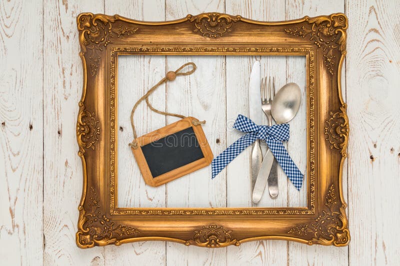 Cutlery in Picture Frame on Wooden Table Stock Photo - Image of ...