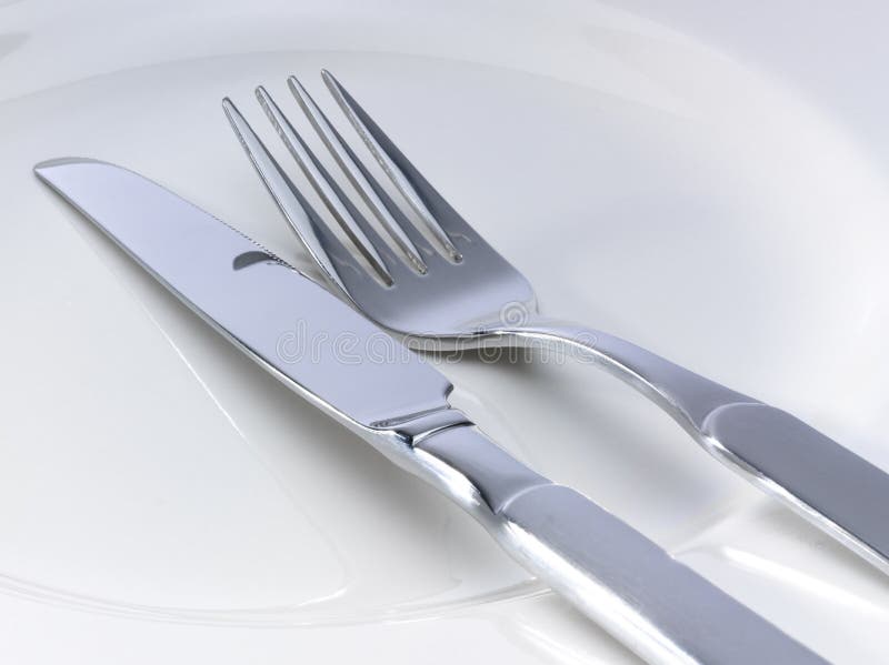 Cutlery on a plate stock image. Image of plate, diner - 21345263