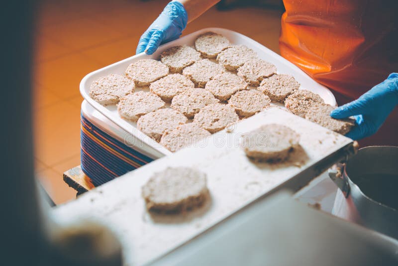 Cutlet making factory stock image. Image of equipment - 139885033