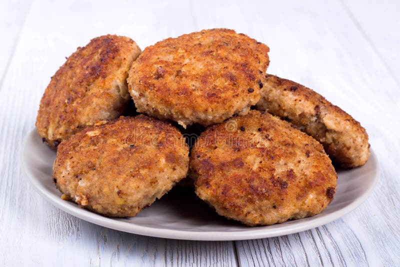 Cutlets on a Grey Plate, on a White Wooden Background Stock Image ...