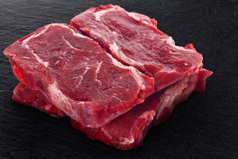 Cuts of beef meat steacks stock image. Image of board - 101041923