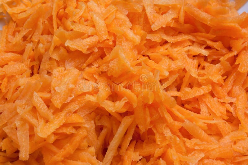 Cutted carrots in a bowl stock image. Image of orange - 121931561