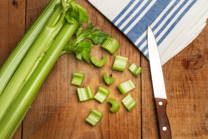 Cutted celery and knife stock photo. Image of vitamins - 104762368