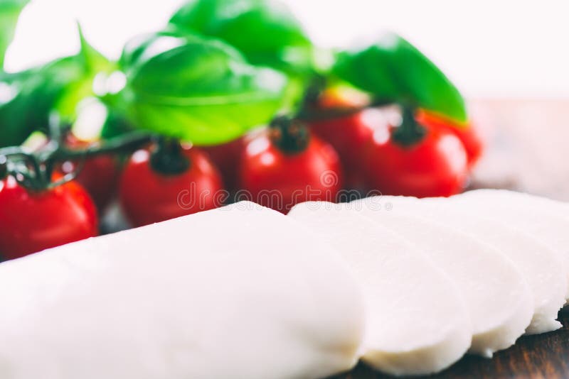 Cutted Mozzarella Cheese with Cherry Tomatoes Stock Image - Image of ...