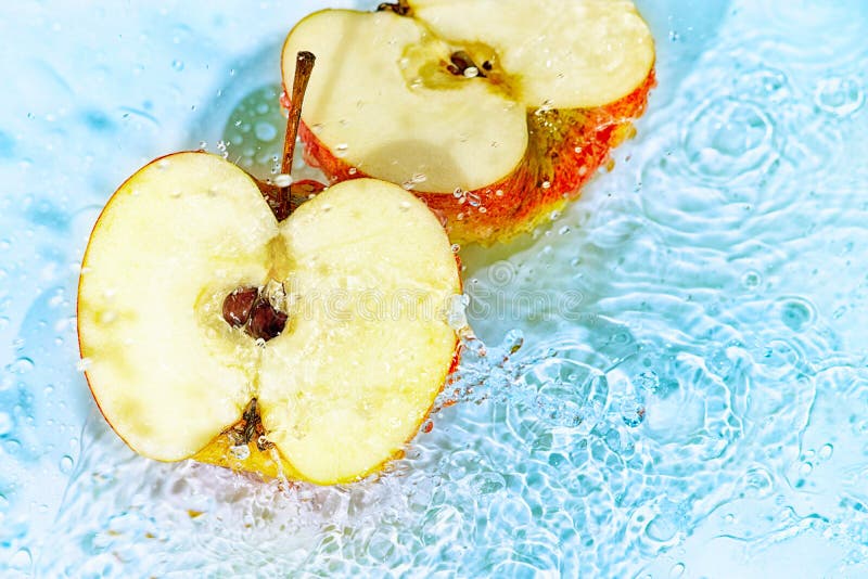 Cutted Red Apple in the Water Stock Photo - Image of food, light: 65290462