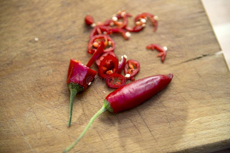 Cutted Spicy chilli pepper stock photo. Image of cutting - 130093034