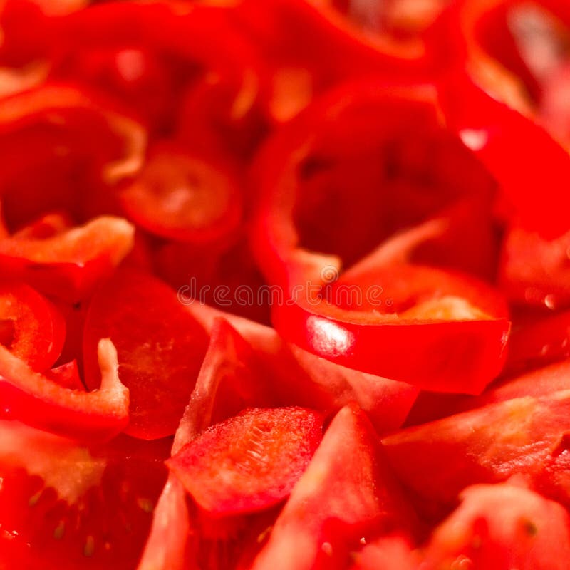 Cutted tomatoes and pepper stock image. Image of dinner - 27353643