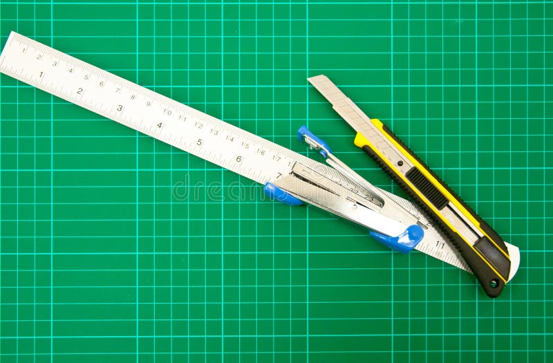 Cutter and Ruler stock image. Image of cutting, ruler - 18687237