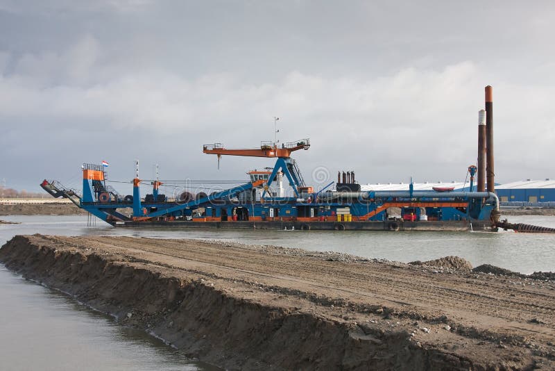A cutter suction Dredger stock photo. Image of occupation - 13044744