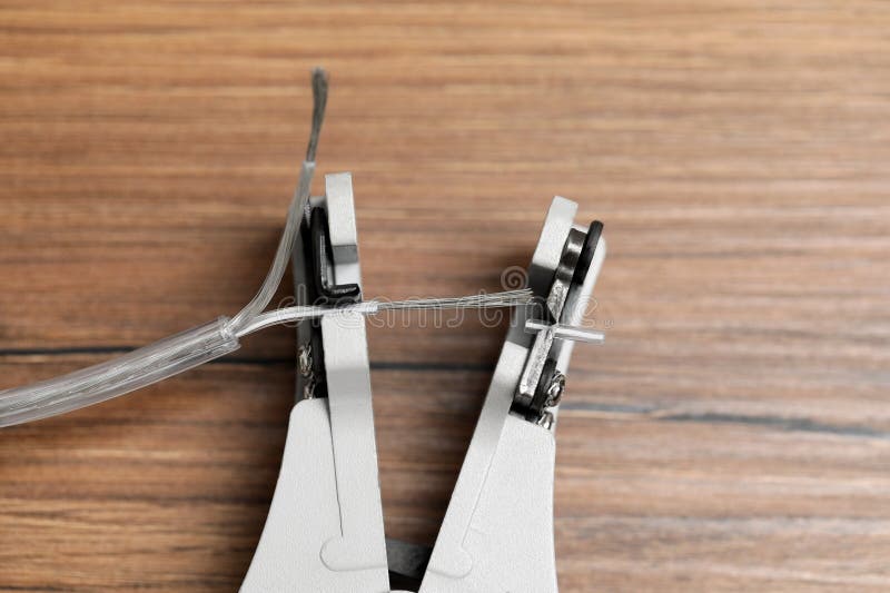 Cutters and Stripped Wire on Wooden Table, Closeup Stock Image - Image ...