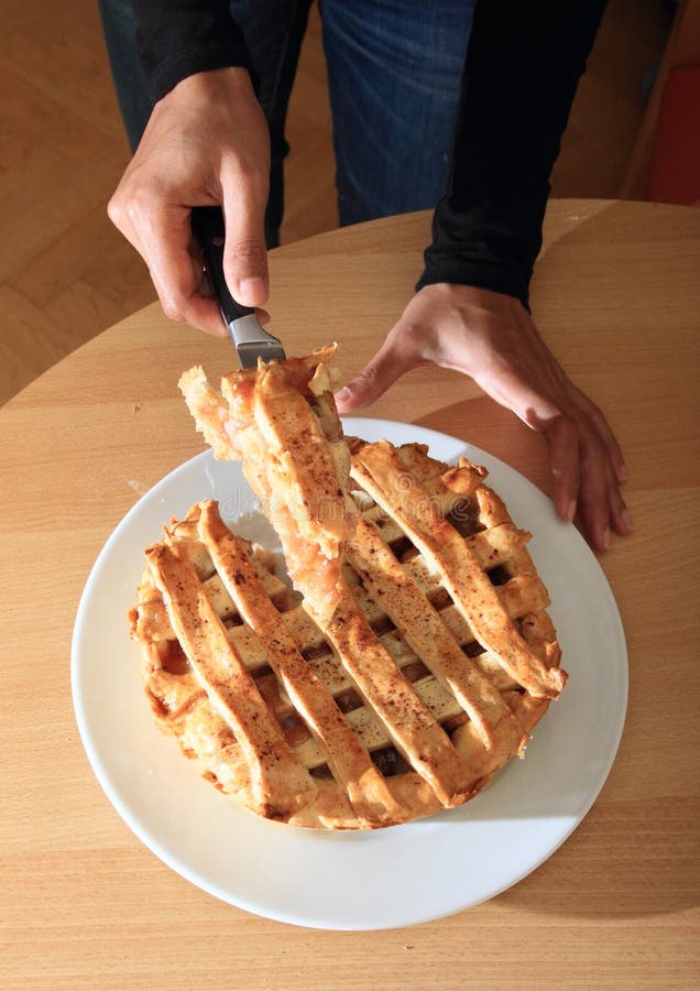 Cutting apple pie stock image. Image of cooking, knife - 64184073