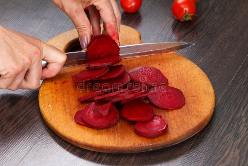 Cutting beet on a board stock photo. Image of table, chef - 74555916