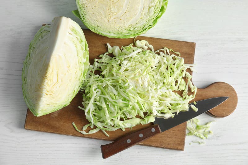 Cutting Board with Chopped and Sliced Cabbage Stock Photo - Image of ... Cutting Board with Chopped and Sliced Cabbage Stock Photo - Image of ...