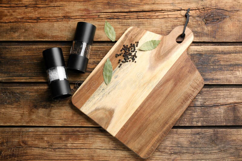Cutting Board and Condiments on Wooden Table, Flat Lay. Cooking Utensil ...