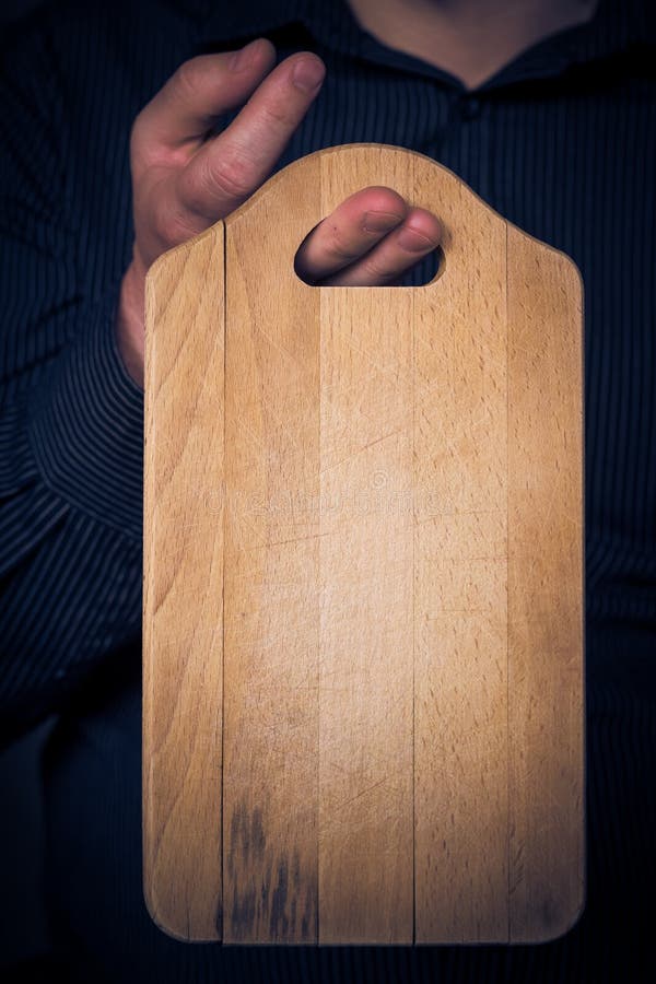 Cutting board hands man stock photo. Image of advertising - 66852828