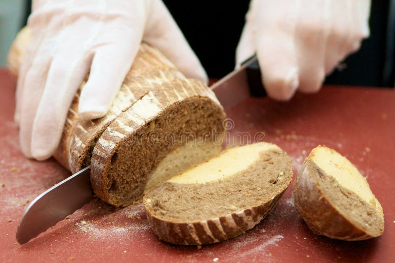 Cutting bread stock image. Image of cutting, kitchen - 22567013