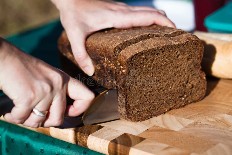 Cutting bread stock photo. Image of knife, food, hearty - 24776832
