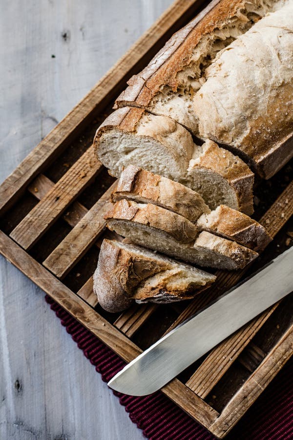 Cutting bread stock image. Image of ingredient, eating - 31390651