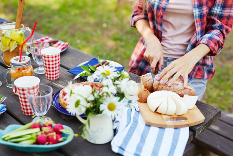 Cutting bread stock image. Image of hand, cutting, drink - 74864395