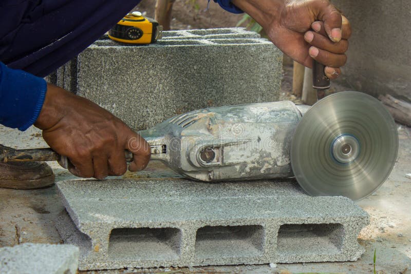 Cutting bricks stock photo. Image of instrument, construction - 60762600