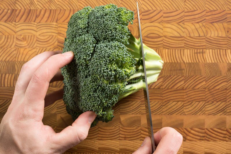 Cutting Broccoli stock image. Image of vegetarian, healthy - 53848255