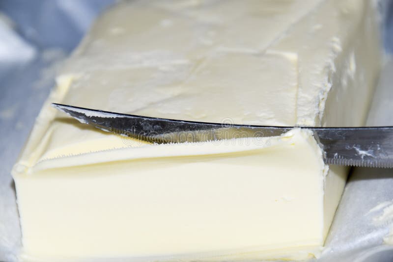 Cutting a Butter Knife. Butter and Knife Stock Image - Image of ...
