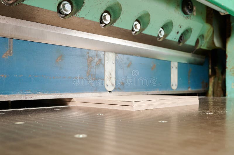 Cutting Cardboard Sheets on Guillotine Shears for Precision Crafting in ...