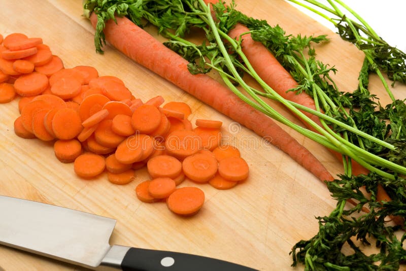Cutting carrots stock photo. Image of plant, food, farm - 11940424
