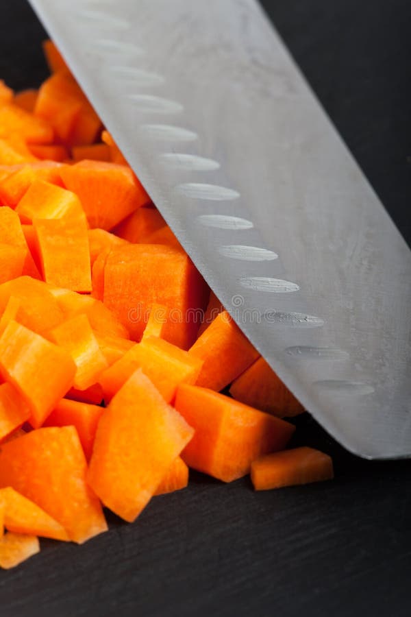 Cutting carrots stock photo. Image of kitchen, macro - 194233546