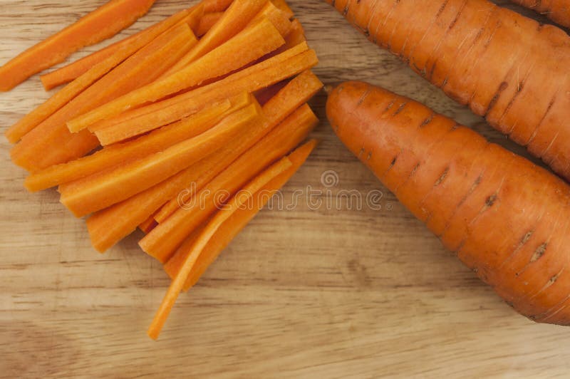 Cutting Carrots into Strips Prepare for Cooking Stock Photo - Image of ...