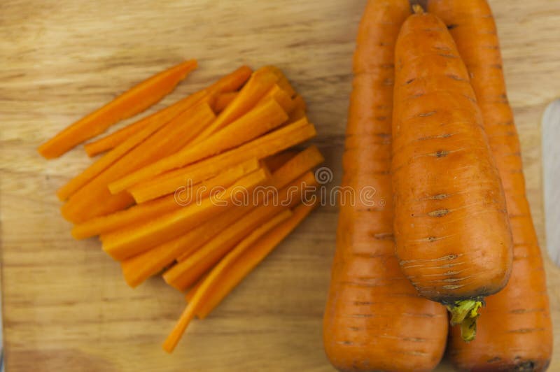 Cutting Carrots into Strips Prepare for Cooking Stock Image - Image of ...