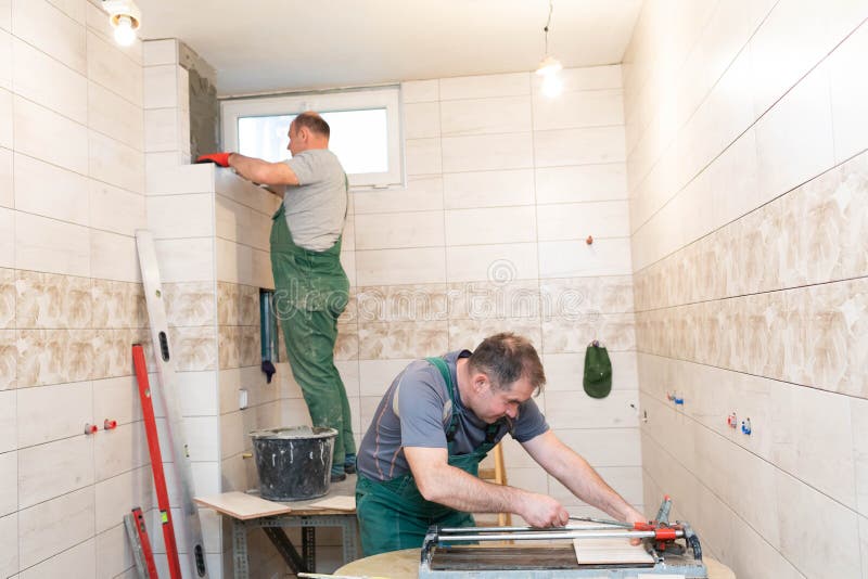 Cutting Ceramic Tiles with a Special Hand Machine with a Sharp Diamond ...