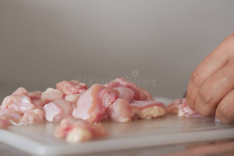 Cutting Chicken Fillet at Cooking Classes. Stock Photo - Image of ...