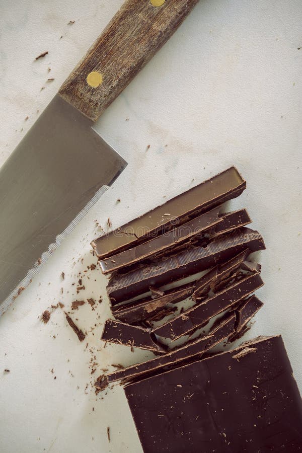 Cutting a chocolate stock image. Image of energy, cacao - 88014011