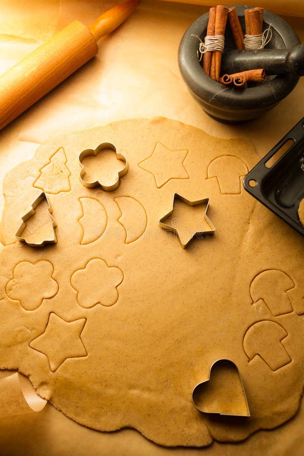 Cutting Christmas cookies stock image. Image of cinnamon - 27580937