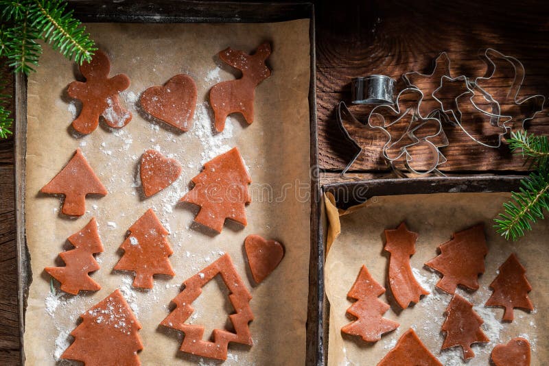 Cutting Christmas Gingerbread Cookies on Baking Tray for Christmas ...